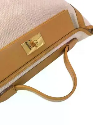 Hermès 24/24 Leather Trimmed Tote Bag