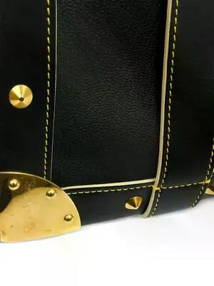 LOUIS VUITTON Studded Leather Handbag
