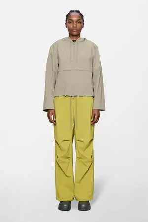 Rains Suva Hardshell Cropped Jacket With Drawstring Hood And Zip Pockets - Beige