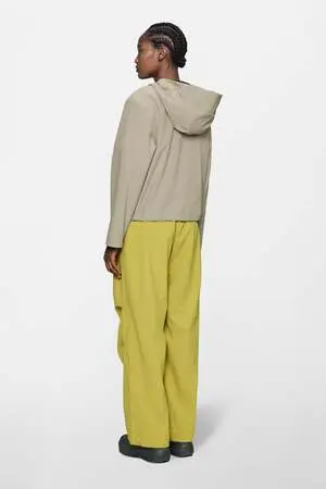 Rains Suva Hardshell Cropped Jacket With Drawstring Hood And Zip Pockets - Beige