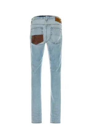 Amiri Distressed Stonewashed Stretch Denim Jeans