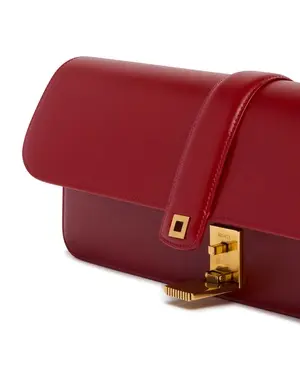 Khaite Polished Leather Clutch Bag With Gold-tone Clasp - Red