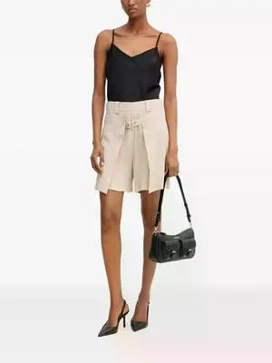 SIMONA CORSELLINI Buckled Pleated Shorts