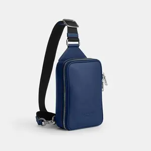 COACH OUTLET Ray Pack Crossgrain Leather Sling Bag With Multifunction Pocket - Silver/deep Blue