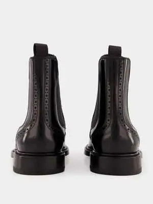 Celine Chelsea Boots With Brogue Detailing In Polished Leather