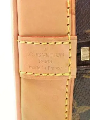 LOUIS VUITTON Monogram Alma Pm Handbag
