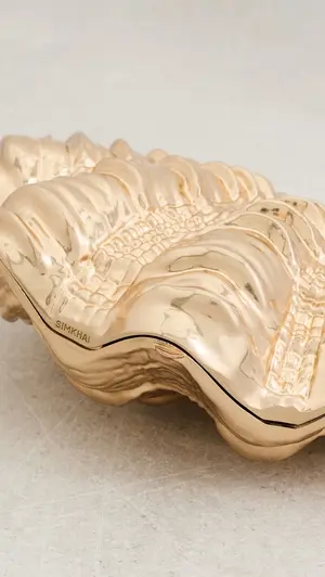 Simkhai Venus Metal Shell Clutch