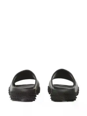 PUMA Mostro Debossed-logo Slides