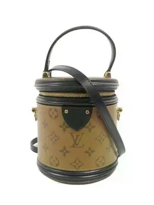 Louis Vuitton Gold Tone Bucket Bags