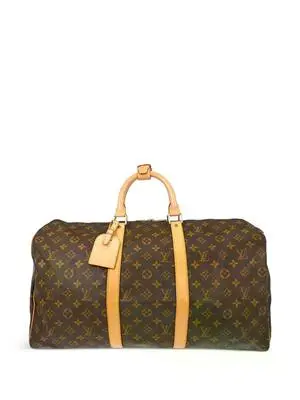 Louis Vuitton Gold Tone Travel Bags