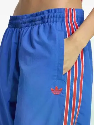 Adidas Sst Track Pants With Embroidered Logo And Side Stripes