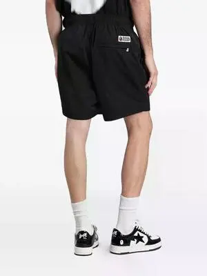 A BATHING APE Ape Head Logo Print Track Shorts
