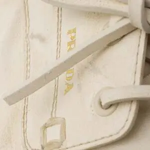 Prada Shuffle Boat Loafers In Antique-effect Leather - White