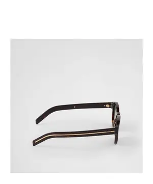 Prada Sunglasses With Iconic Metal Plaque And Triangular Rivets