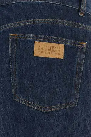 MAISON MARGIELA Stonewashed Denim Jeans With Distressed Details