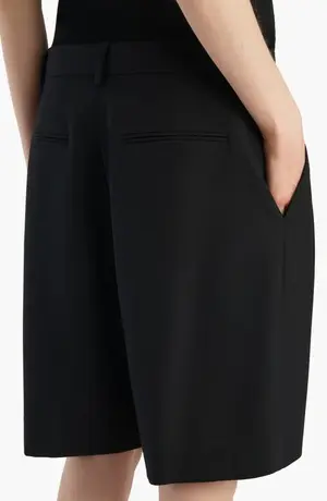 Khaite Auggie Pleated Wool Wide Leg Shorts
