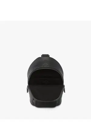 Mcm Embossed Monogram Leather Sling Bag
