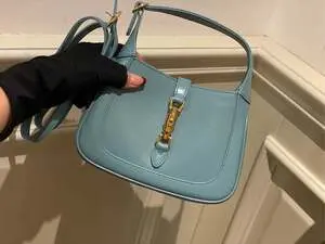 Gucci Leather Shoulder Bag With Gold Tone Clasp - Multicolor