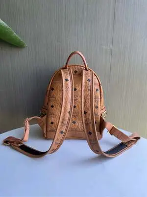Mcm Leather Studded Monogrammed Backpack