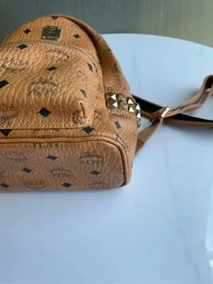 Mcm Leather Studded Monogrammed Backpack