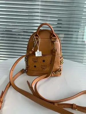 Mcm Leather Monogram Studded Backpack
