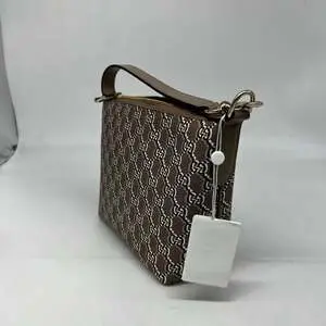 Gucci Monogrammed Leather Bag