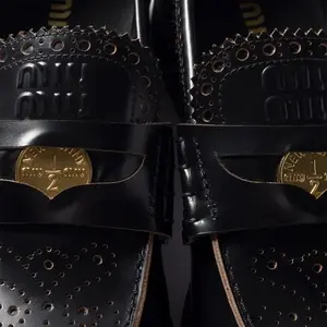 Miu Miu Perforated Loafers With Coin Detail