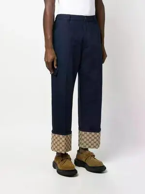 Gucci Gg Supreme Paneled Straight-leg Trousers