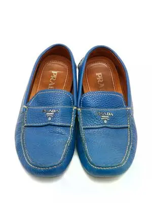 Prada Logo Plaque Pebbled Leather Loafers