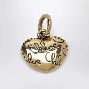 Chloé Alphabet Heart Logo Charm In Brass - Silver