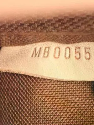 LOUIS VUITTON Monogram Canvas Saumur 30 Bag