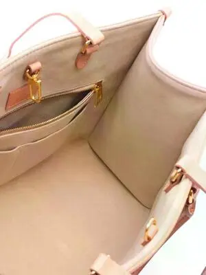 LOUIS VUITTON Monogram Empreinte On-the-go Tote Bag - Pink