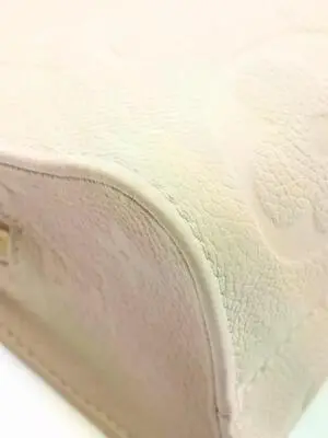 LOUIS VUITTON Monogram Empreinte On-the-go Ew Handbag