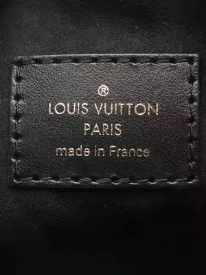 LOUIS VUITTON Monogram Kanoe Handbag