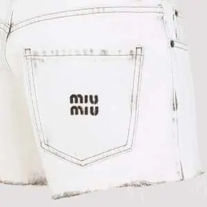 Miu Miu Bleached Cotton Denim Shorts With Raw Edge Hem - White