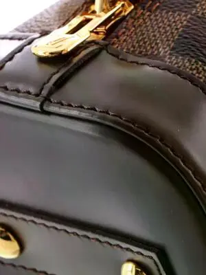LOUIS VUITTON Alma Handbag - Brown