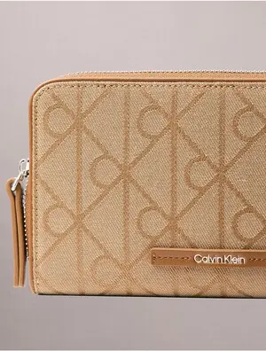 Calvin Klein Allover Emblem Logo Passport Wallet