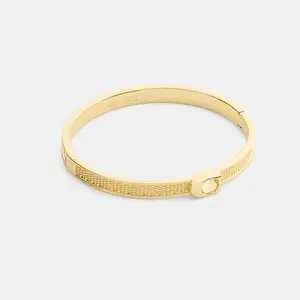 COACH Textured Signature Hinged Bangle - Gold