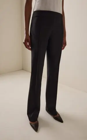 THE ROW Fabien Low-rise Stretch-wool Flared Pants