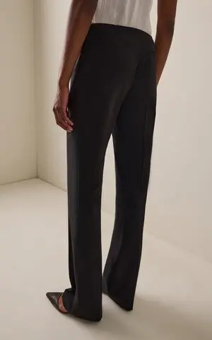 THE ROW Fabien Low-rise Stretch-wool Flared Pants