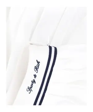 SPORTY  RICH Sporty & Rich Pleated Midi Skirt With Logo Embroidery
