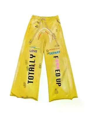 ASTRUM Distressed Wide-leg Track Pants - Yellow