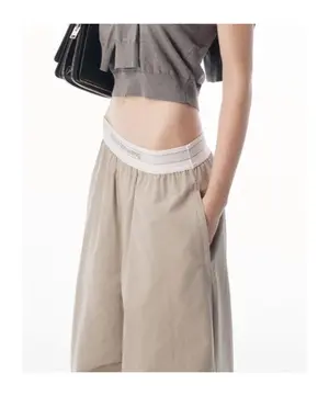 Alexander Wang Logo-elastic Pleated-knee Trousers
