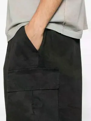 STAY HUMAN ON EARTH Camouflage Print Cargo Shorts