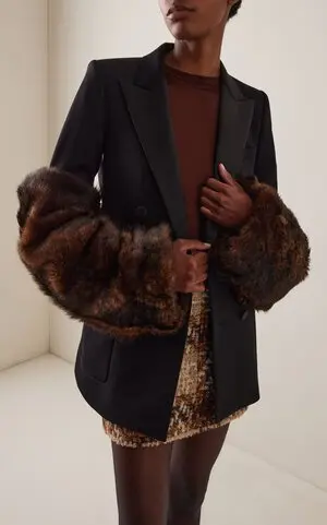 Saint Laurent Long Shearling Muffs With Silk Lining