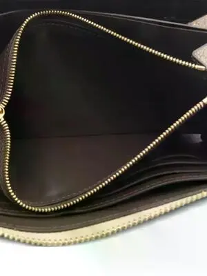 LOUIS VUITTON Comete Taurillon Leather Wallet