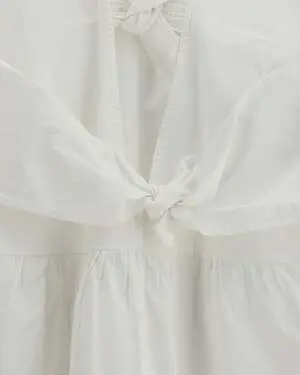 GANNI Mini Dress With A Deep V-neckline And Front Tie Bands