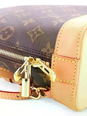 LOUIS VUITTON Alma Monogram Canvas Backpack