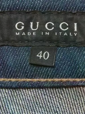 Gucci Flared Jeans With Logo Patch