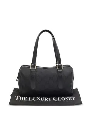 Gucci Small Gg Leather-trim Duffle Bag
